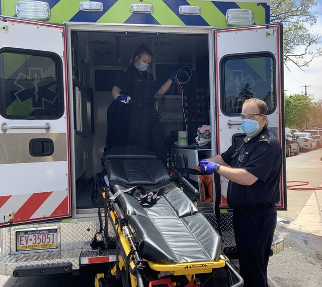 Geisinger volunteers honor EMS providers by washing ambulances ...
